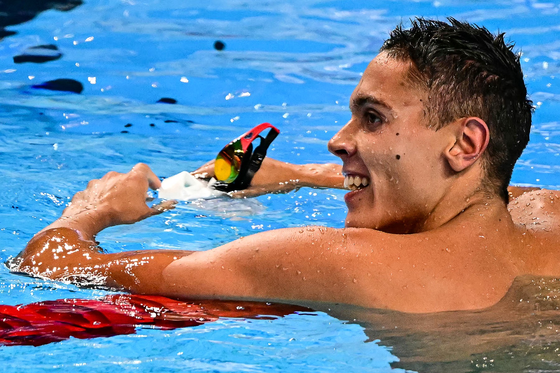 David Popovici, prima reacţie după medalia de aur la proba de 100 m ...